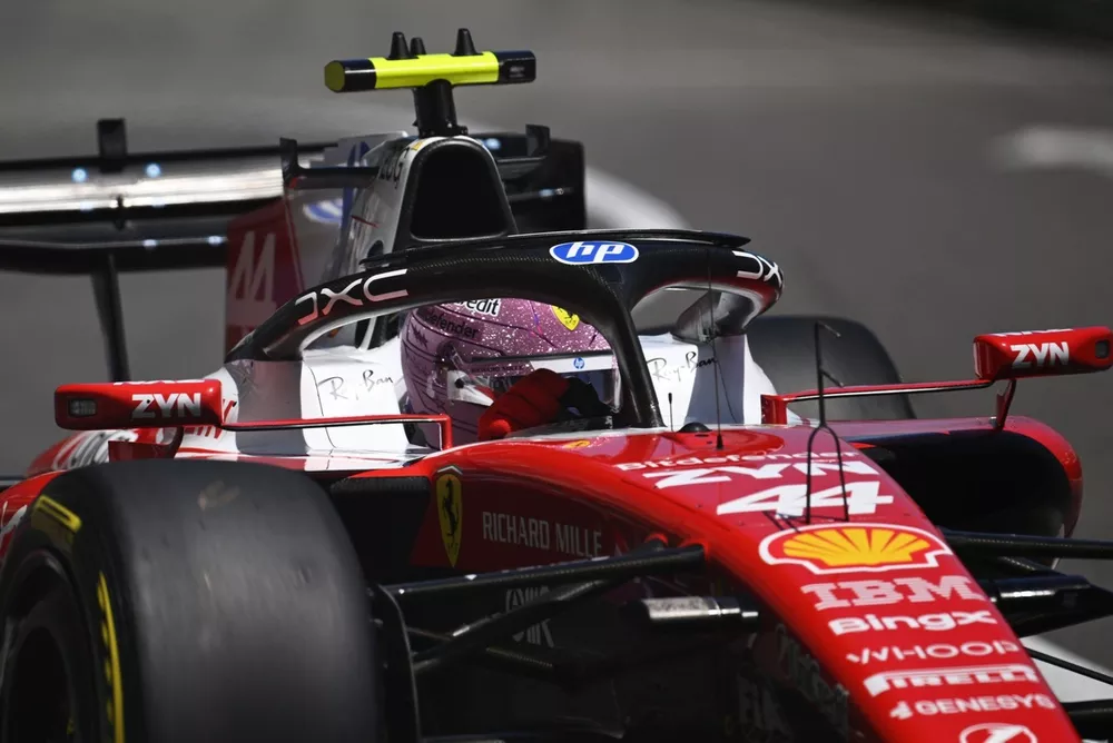 Lewis Hamilton divides F1 fans with sparkly pink Ferrari helmet at ...