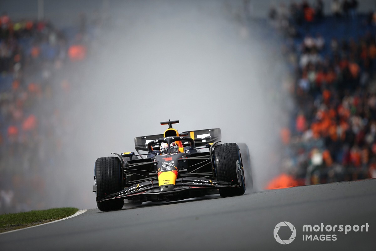 Formula One Cars In The Rain